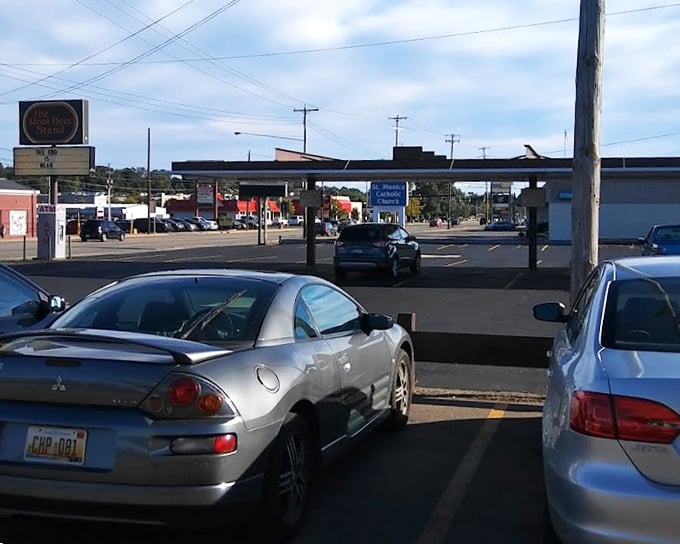 From this parking lot view, you can almost hear the decades of conversations that have happened over root beer and hot dogs.