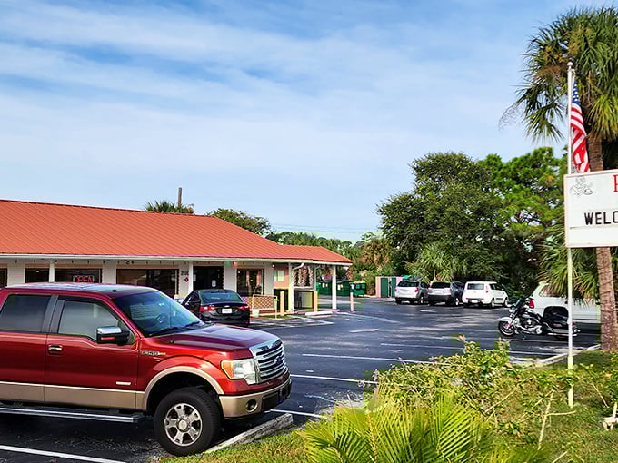 The parking lot might not win design awards, but it's what's inside that counts. Florida palm trees stand guard over culinary treasures.