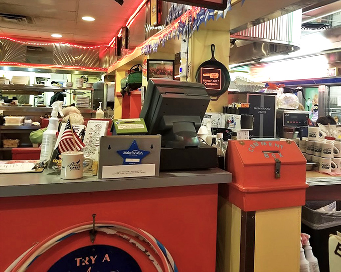 Where transactions happen and pie temptations begin. That vintage cash register has seen more food-induced smiles than a dentist's office.