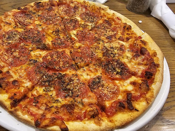 This isn't just pizza &ndash; it's what happens when a seafood place decides to show off its versatility. That crispy, cheesy perfection deserves respect.