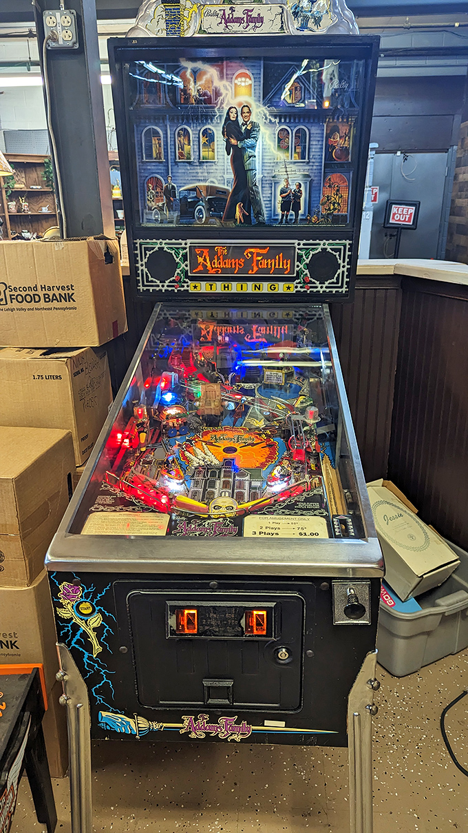 The Addams Family pinball machine glows with nostalgic appeal. Three plays for a dollar might be the best entertainment value in Pennsylvania.