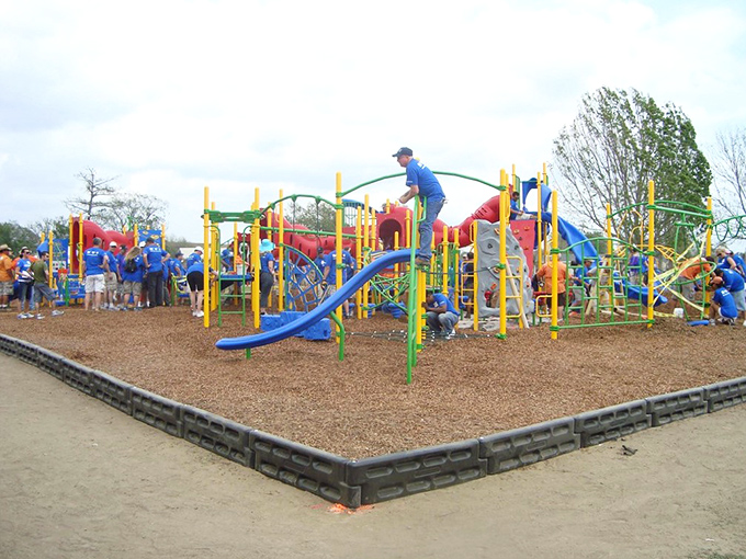 Community spirit in action—this colorful playground wasn't just built for children, but by neighbors coming together.