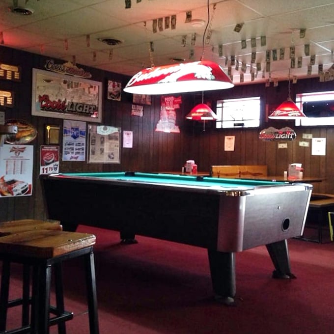 The pool table stands ready for post-rib entertainment. Many friendships have been tested and strengthened over these felt-covered rails.