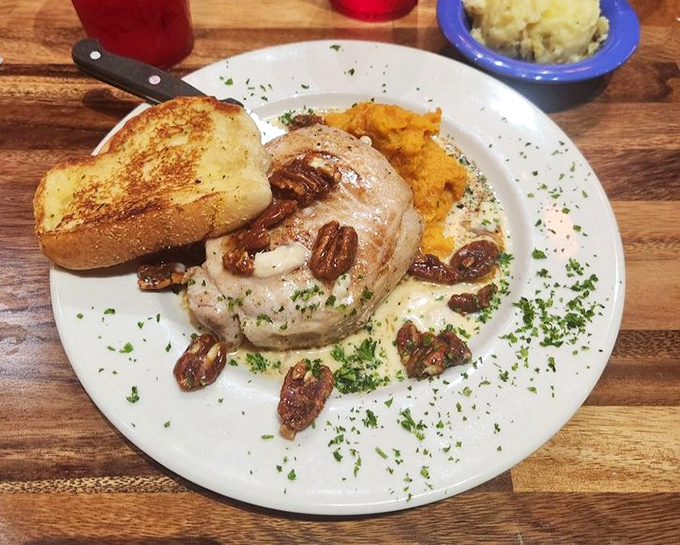 A beautifully plated porkchop with candied pecans proves that Josie's takes dinner just as seriously as they take morning meals.
