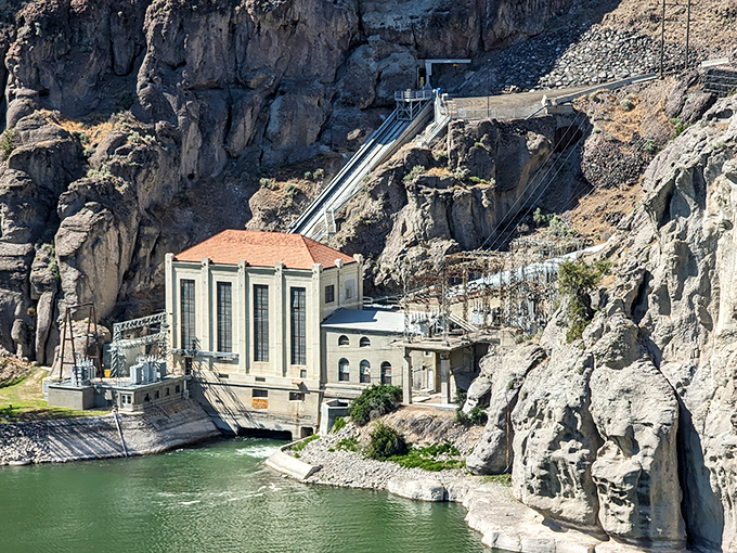 The historic power station nestled against the canyon wall&mdash;proof that beauty and utility can coexist. Engineering meets raw nature.