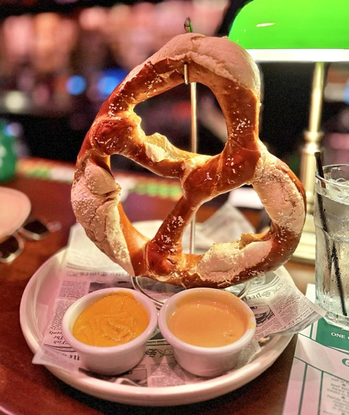 This pretzel has clearly been working out&mdash;twisted, bronzed, and suspended dramatically above dipping sauces like a carb-loaded Olympic gymnast sticking the landing.