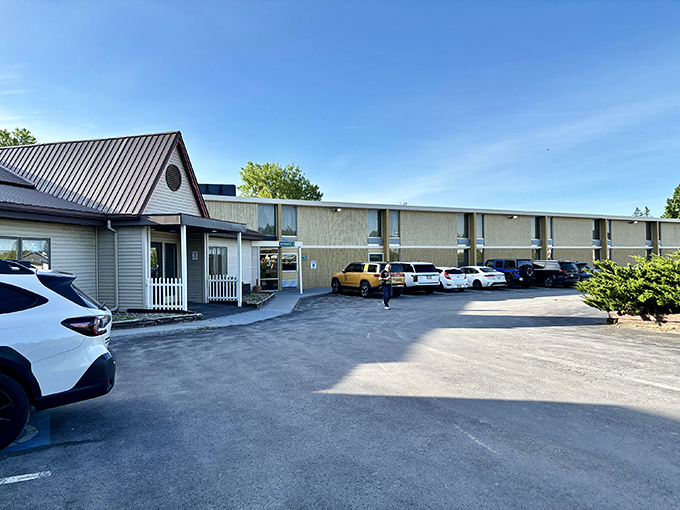 The Quality Inn welcomes travelers with its distinctive entrance, providing a comfortable stay just minutes from downtown Plattsburgh.