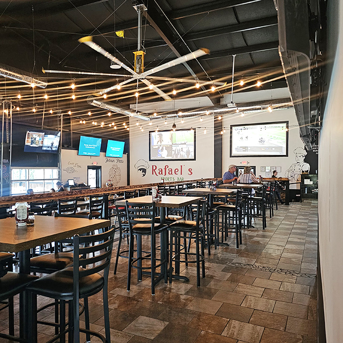 Rafael's industrial-chic interior offers the perfect backdrop for both sports watching and serious pizza contemplation.
