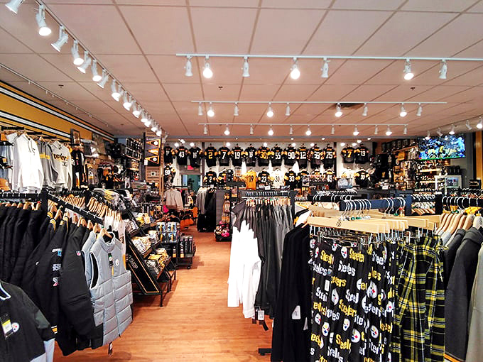 Black and gold dominate this sports paradise, where Pennsylvania pride hangs from every rack and display.