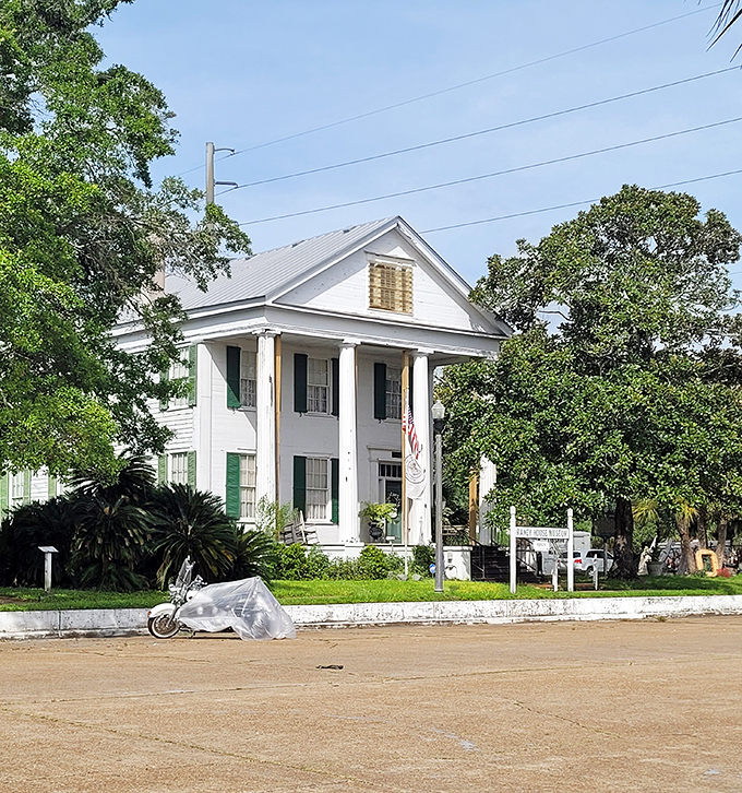 The Raney House Museum stands as a testament to Southern architecture and the era when porches were social media platforms.