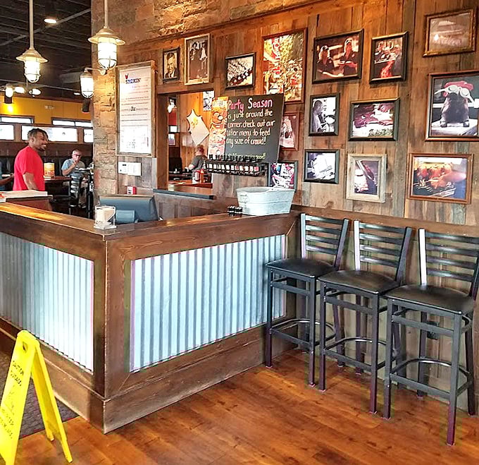 The reception area blends rustic wood with corrugated metal, creating a space that feels both authentically Southern and genuinely welcoming.