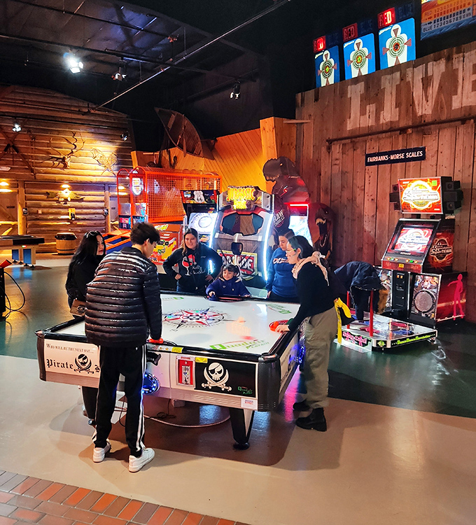 The arcade area&mdash;where kids play while parents' credit cards recover from the shopping equivalent of running a marathon.
