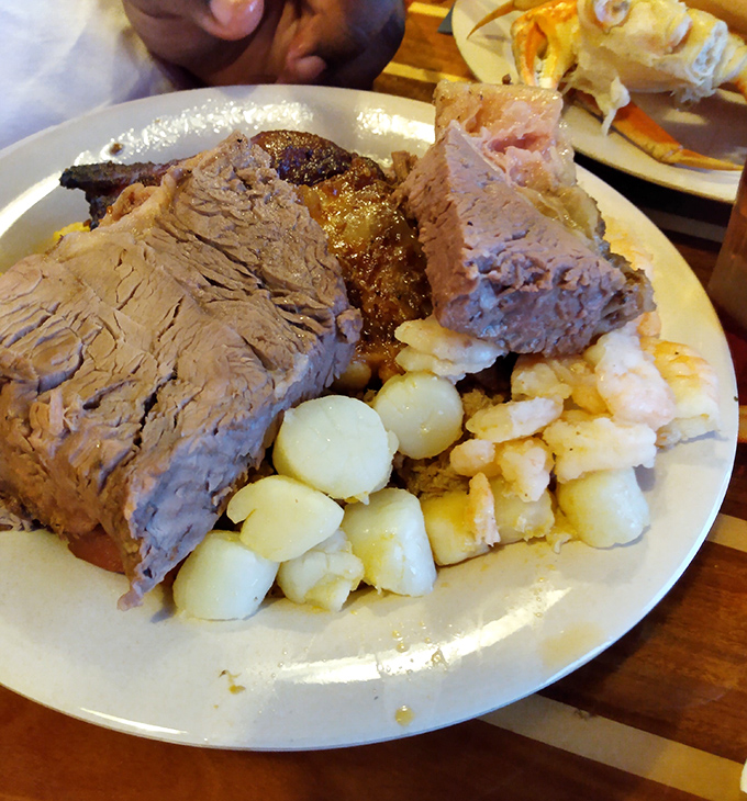 Tender roast beef with perfectly roasted potatoes – because even at a seafood restaurant, the land options deserve their moment in the spotlight.