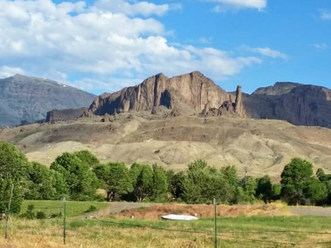 Mountains that look Photoshopped even in real life. This ridgeline has been perfecting its dramatic silhouette since before humans learned to take selfies.