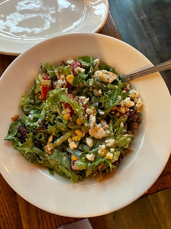 A salad that doesn't apologize for being a salad. Fresh greens, vibrant vegetables, and cheese that makes eating healthy feel indulgent.