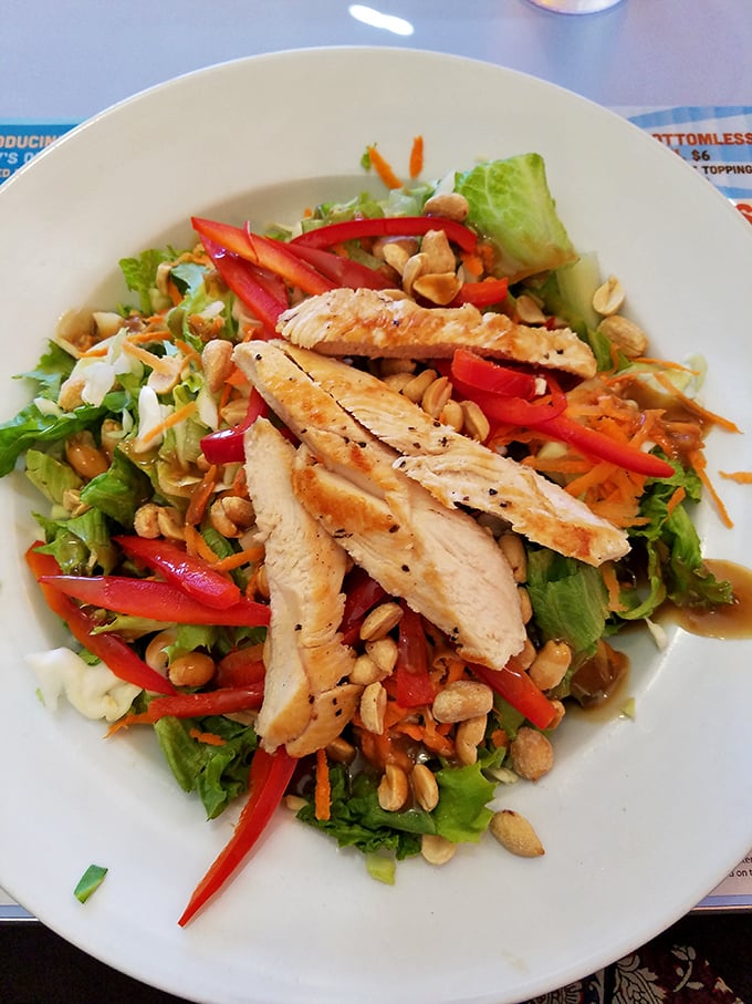 A salad that actually excites&mdash;crisp vegetables, grilled chicken, and crunchy nuts creating a symphony of textures that makes eating healthy feel like cheating.
