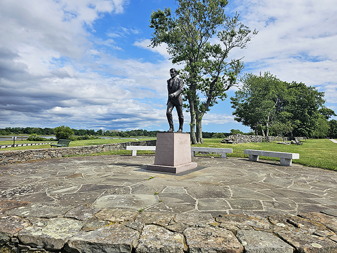 A moment of reflection at the Samuel P. Colt Monument. His vision transformed private estate into public treasure that generations continue to enjoy.