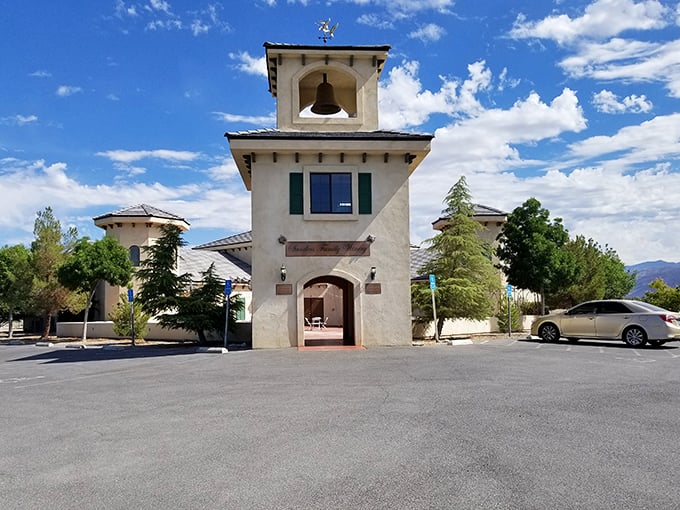 Bell tower elegance announces Sanders Family Winery. This Tuscan-inspired entrance promises wine experiences that transport you far beyond Nevada.