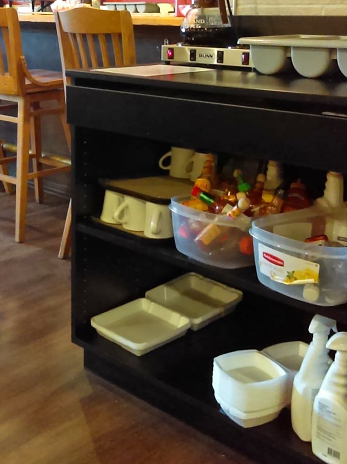 The organized chaos behind the scenes &ndash; where condiments and containers stand ready for the breakfast battlefield that is a busy weekend morning.