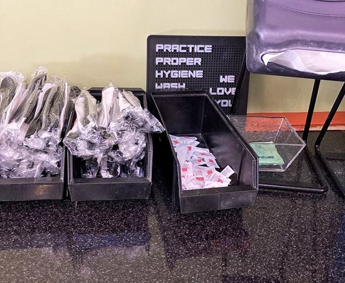 "Practice proper hygiene" says the sign, because nothing ruins a good pizza experience like improper utensil etiquette.