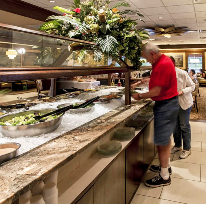The salad bar setup isn't just food – it's a choose-your-own-adventure story where every ending is delicious and involves fresh vegetables.