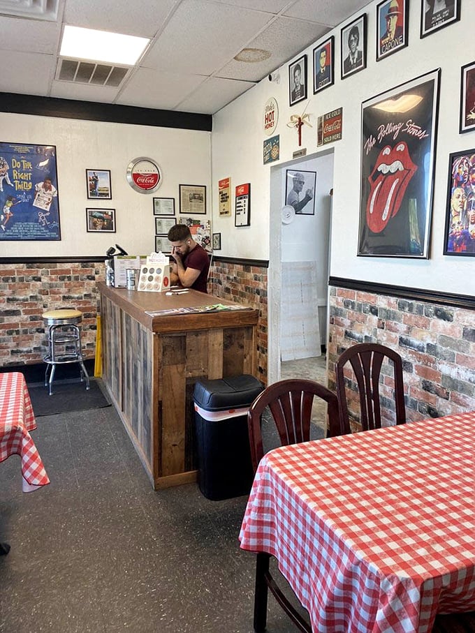 The counter tells stories of countless pizzas past &ndash; each scratch and mark a testament to years of feeding the Fort Myers faithful.