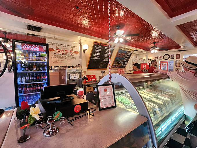 Another angle reveals the Coca-Cola cooler standing guard like a vintage sentinel of refreshment and nostalgia.
