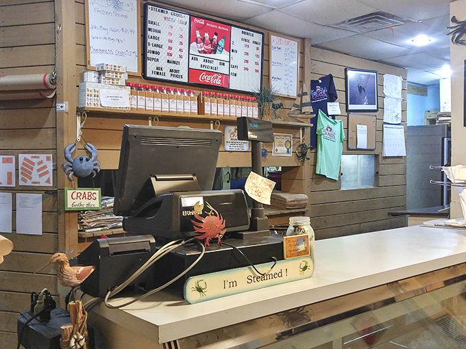 The order counter combines efficiency with personality, where crab-themed decorations remind you that yes, you're absolutely in the right place.
