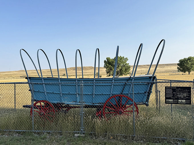 Pioneers crossed Wyoming in wagons like these, though probably with fewer interpretive signs and considerably more dysentery.