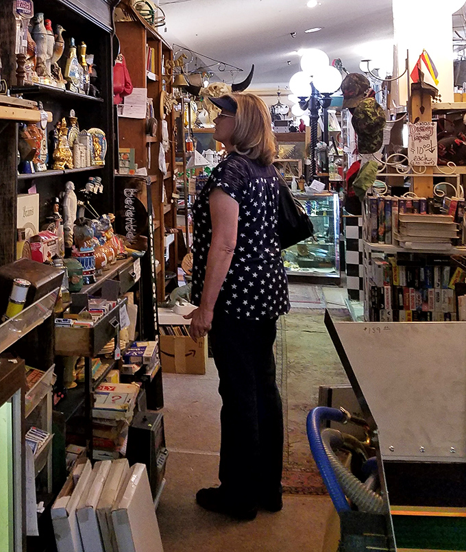 The quintessential antique store moment&mdash;discovery in progress. Every aisle promises that perfect something you never knew you desperately needed.