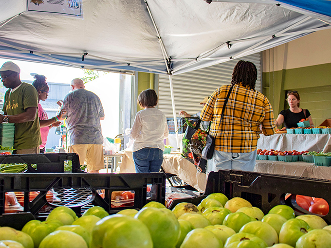 The Saturday morning dance of commerce and community, where recipes are swapped as freely as cash for those perfect peaches.