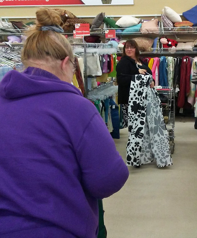 The thrill of the hunt captured in real time. That black and white dress might become someone's "you'll never believe where I found this" story. 