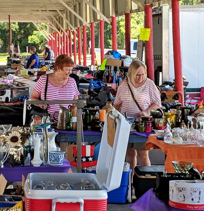 The true flea market experience: shoppers hunting for that perfect something among tables of beautiful someone-else's-junk.