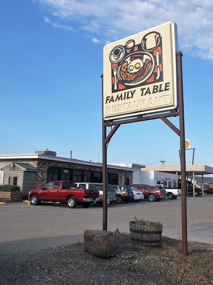 The roadside sign stands like a beacon of hope for travelers whose stomachs are running on empty.