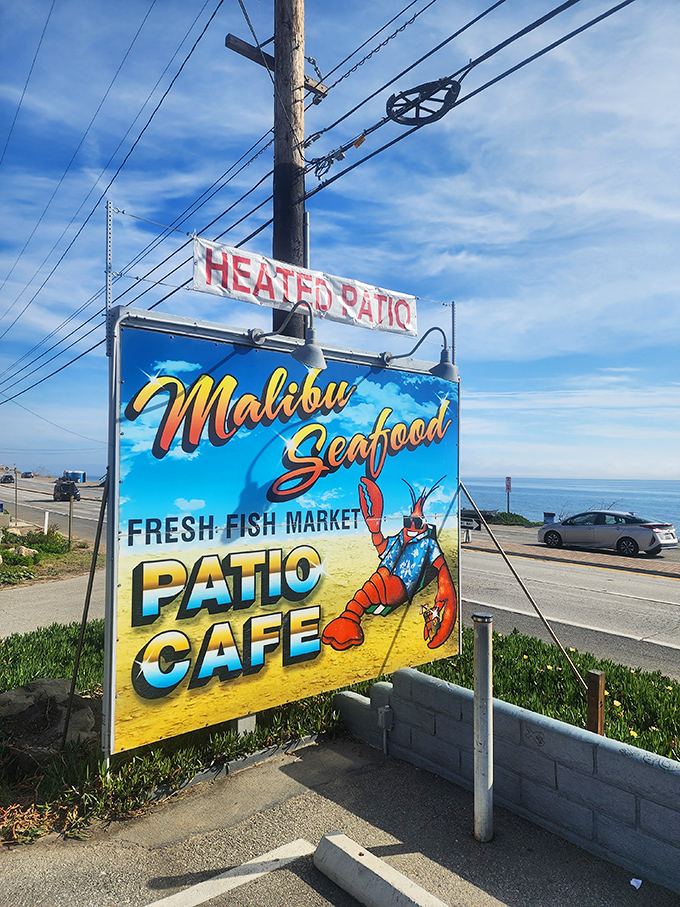 The sign says it all&mdash;fresh fish market and patio caf&eacute;. That cartoon lobster in the Hawaiian shirt knows you're in for a good time.