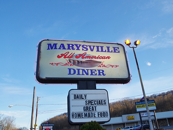 That illuminated sign isn't just advertising – it's a beacon of hope for hungry travelers and a landmark for locals giving directions.
