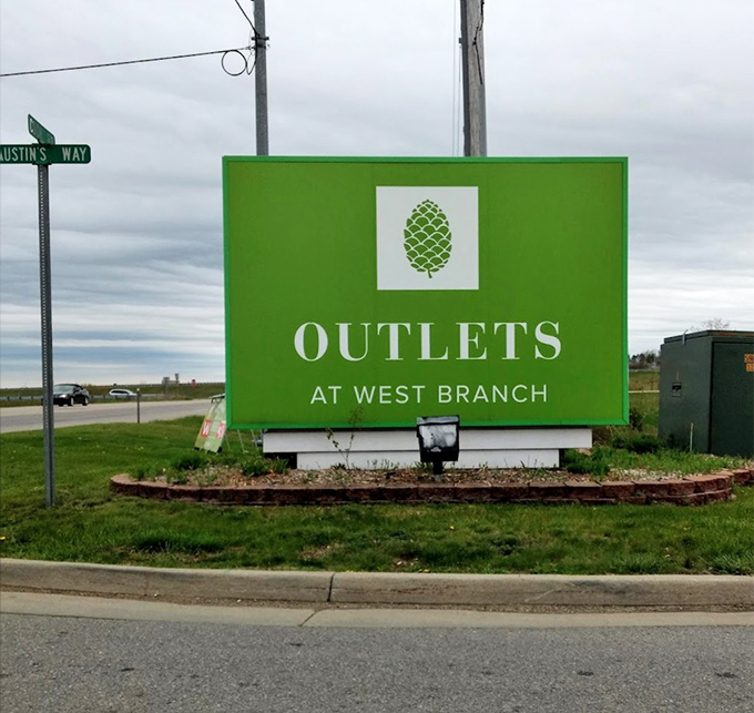 The distinctive green sign welcomes bargain hunters from across Michigan, standing like a retail lighthouse guiding shoppers safely to discount shores.