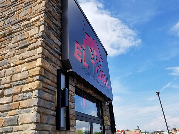 The restaurant's signature bull watches over Upper River Road like a guardian of good taste. A sign that promises adventure for your taste buds. 
