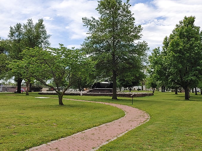 Winding brick pathways through Veterans Park invite contemplative strolls under shade trees that have witnessed decades of picnics and proposals.