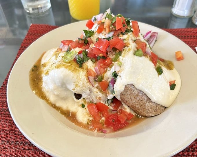A breakfast burrito smothered in possibilities and topped with fresh salsa. Morning hunger doesn't stand a chance against this flavor fortress wrapped in a tortilla.