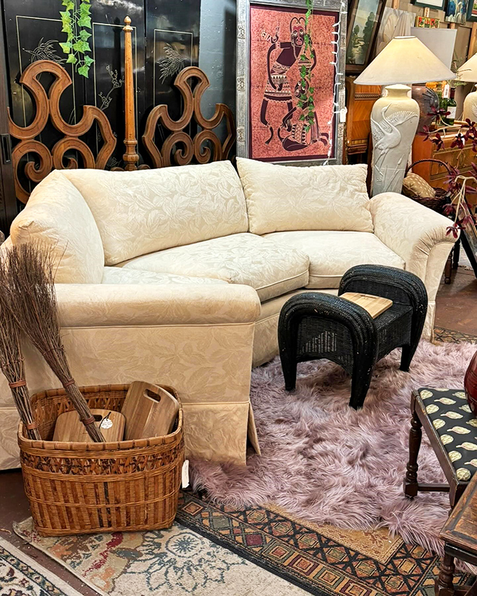 That cream sectional isn't just a sofa&mdash;it's an invitation to reimagine your living room with unexpected vintage elegance.