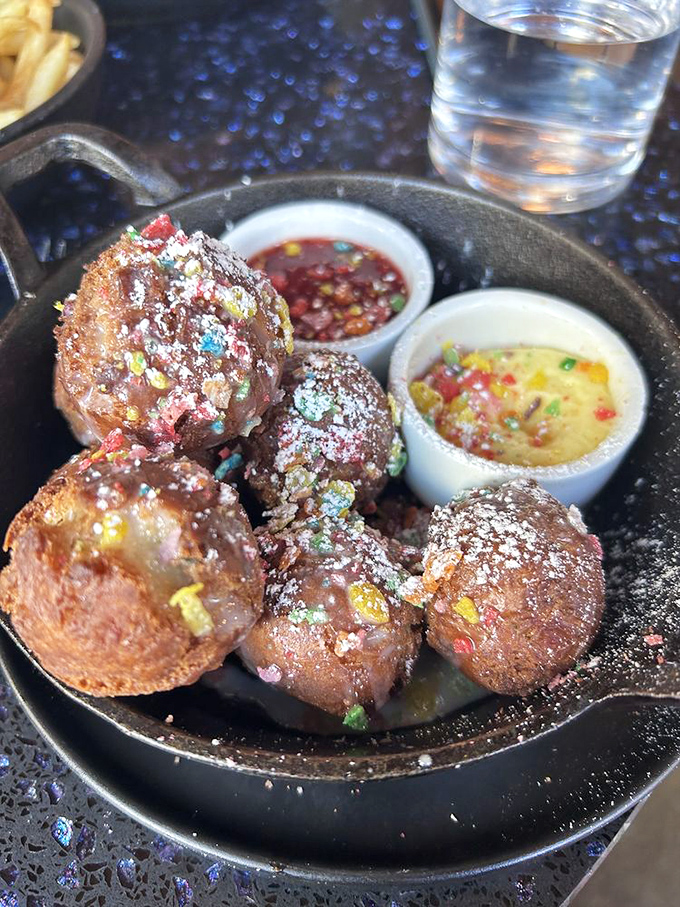 These aren't just donut holes&mdash;they're "Spaceballs" dusted with cosmic sprinkles and served with dipping sauces worth crossing galaxies for.