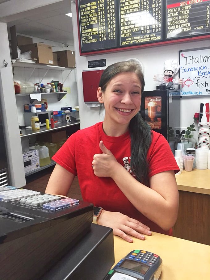 The staff's genuine smiles suggest they might be as happy about your gyro as you are.
