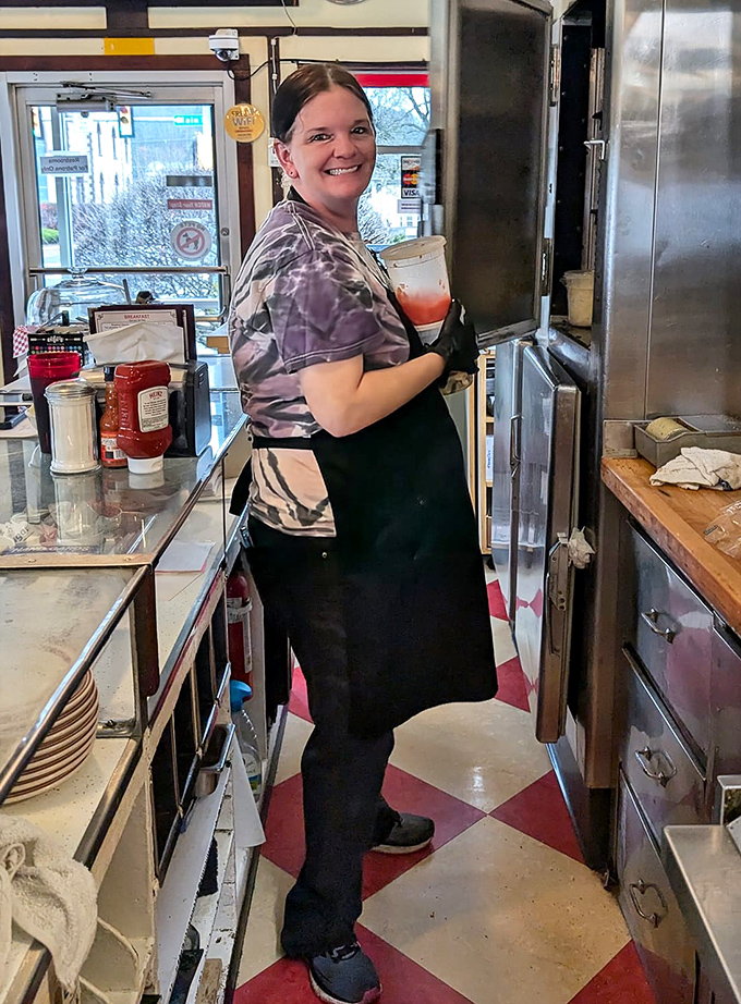 The staff moves with the practiced efficiency that comes from knowing exactly how many steps it takes to deliver happiness from grill to table.