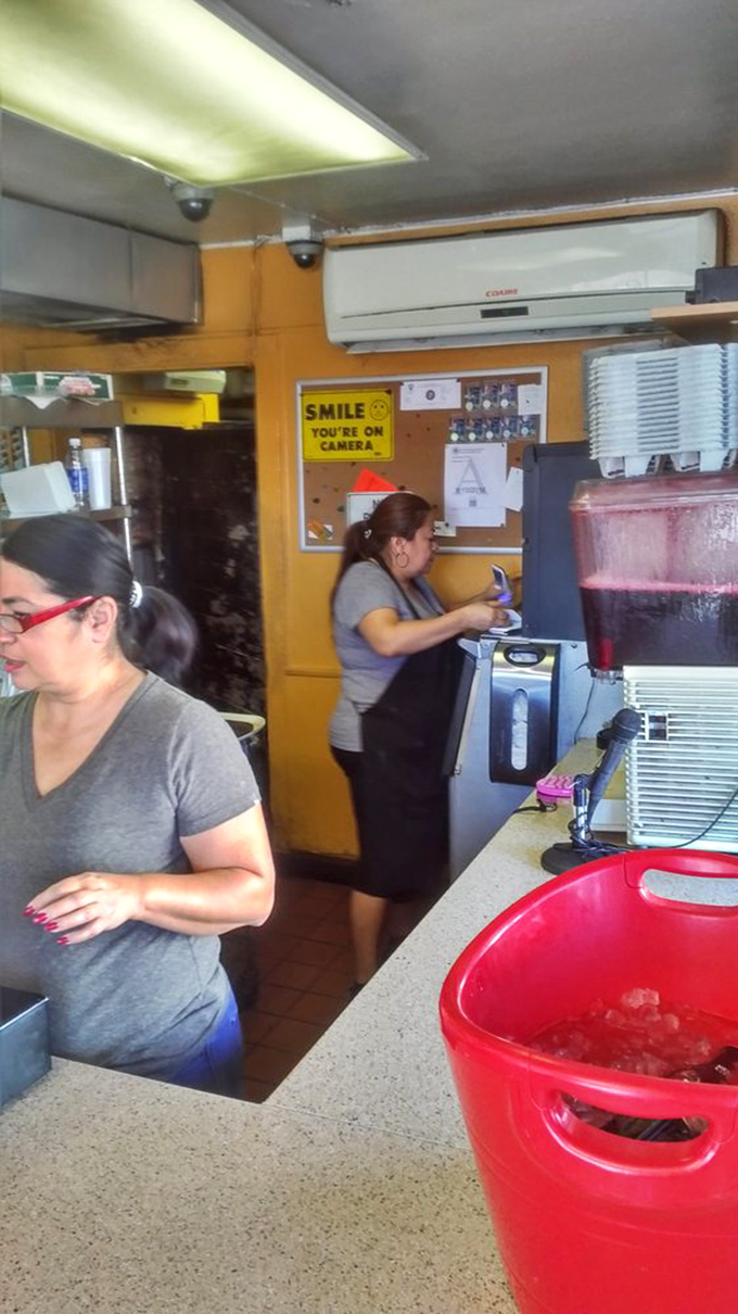 The kitchen crew moves with the precision of a ballet and the speed of a sprint. That fruit drink dispenser isn't just making beverages&mdash;it's making memories.