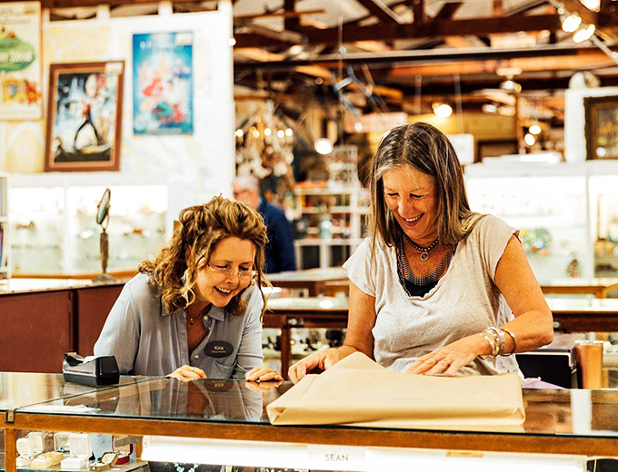 Two enthusiasts sharing discoveries like archaeologists who just found the Holy Grail of vintage treasures.