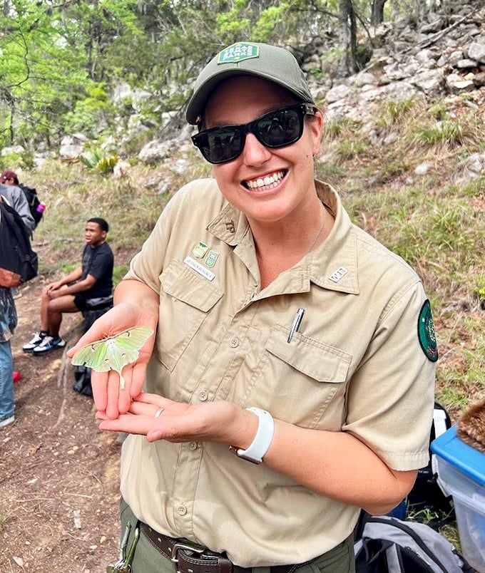 Park rangers bring enthusiasm and knowledge to every encounter, turning a simple moth into a moment of wonder.