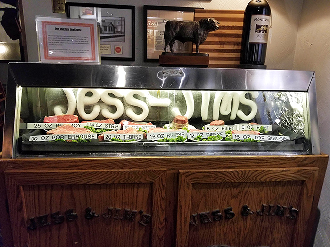 The meat display case—a glass-fronted altar where steaks await their destiny and customers contemplate life-changing decisions.