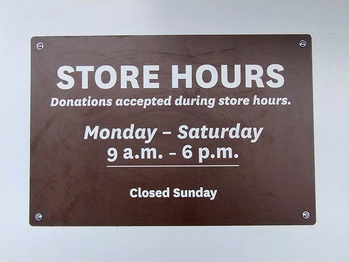 The no-nonsense hours sign reminds us that even treasure hunting needs boundaries&mdash;open Monday through Saturday, closed Sunday for rest.