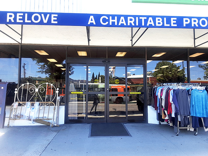 "Relove" indeed&mdash;the entrance displays the thrift store philosophy in action. Even that white metal headboard deserves a second chance at bedroom stardom.